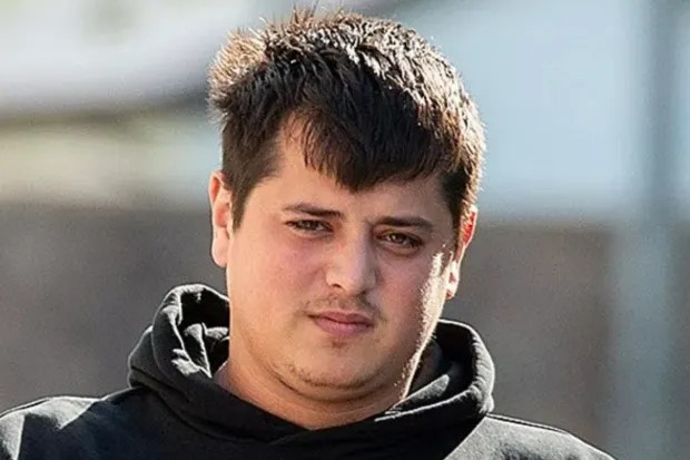 Truck driver, 23, remanded over allegedly smuggling 2 people into ...